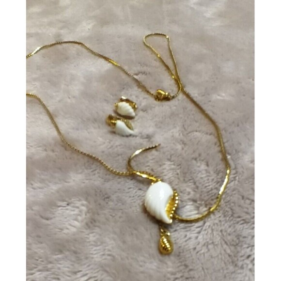 Avon | Jewelry | Vintage Avon Chain Necklace White Lucite Shell Slide ...